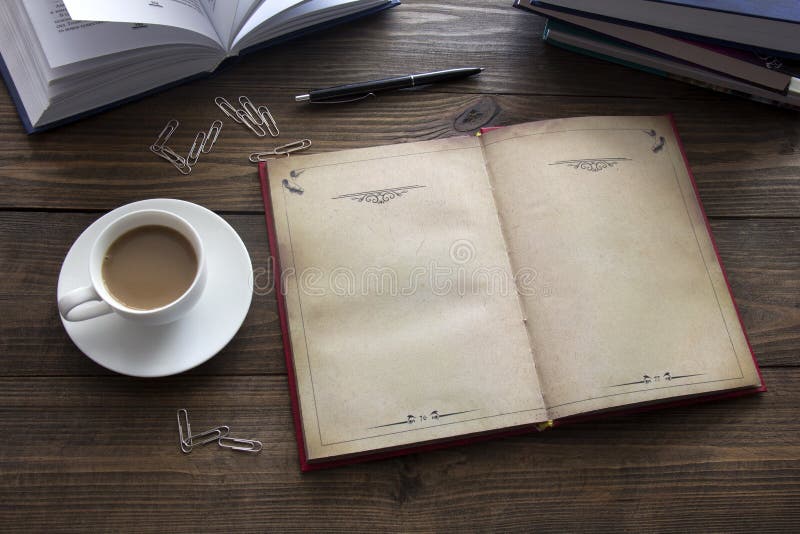 Coffee , books , a pen stock photo. Image of imagery - 59646682