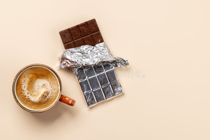 Coffee Break Bliss: Chocolate Bar Paired with a Cup of Coffee Stock ...