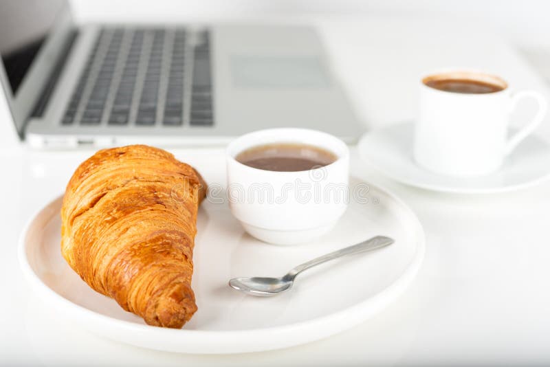 Coffee Break in the Office on the Side View Table Near the Laptop Stock ...