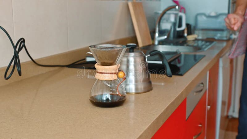 Coffee Brewing in a Modern Kitchen Using a Chemex Dripper Stock Video ...