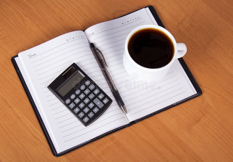 Coffee and Calculator on Open Notebook Stock Image - Image of page ...