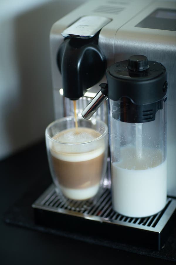 Coffee Capsule Machine and Milk Dispensing Caffe Latte Editorial Image ...