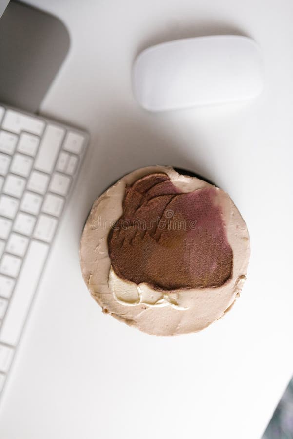 Coffee Chocolate Bento Cake on Desktop with Keyboard and Mouse Stock ...