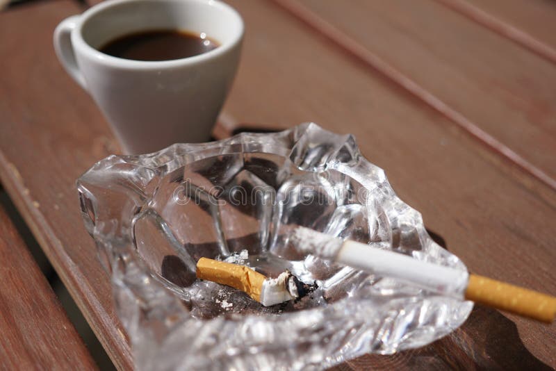 Coffee and cigarette stock image. Image of liquid, addict - 114547153