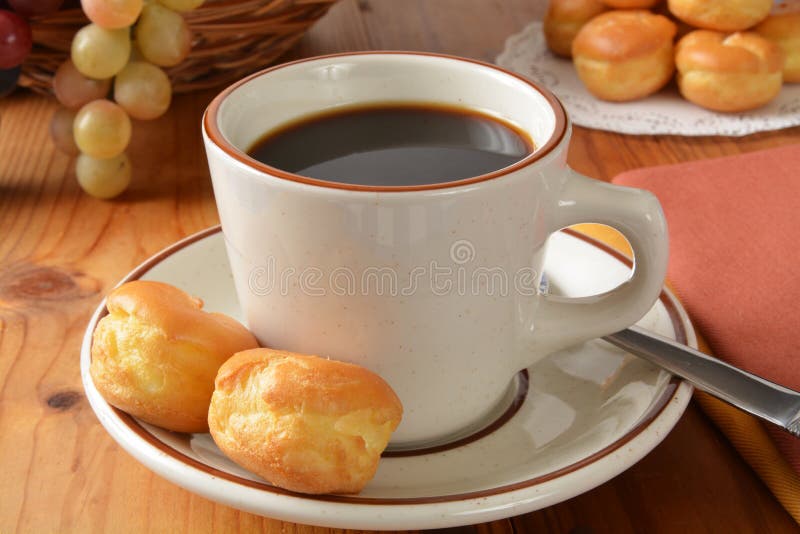 Coffee with cream puffs stock image. Image of snack, black - 44076897