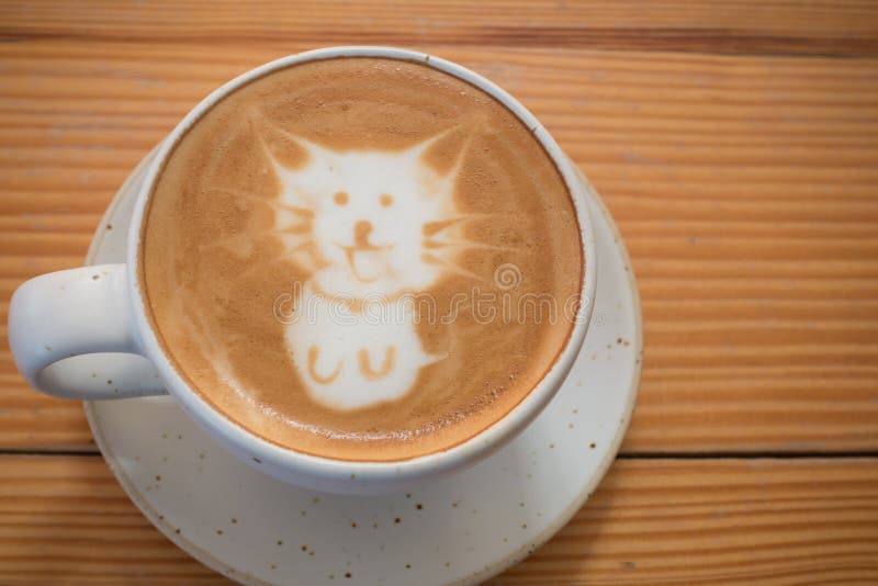 Coffee Cup with Artistic Cream Cat Face Decoration Stock Image - Image ...