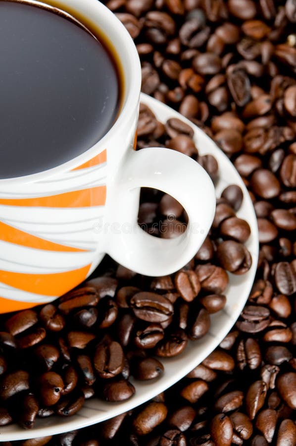 Coffee cup and beans stock photo. Image of cafeteria - 14769918