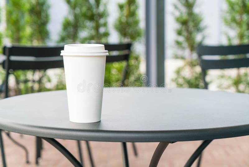 Coffee cup in coffee shop stock photo. Image of drink - 93523244