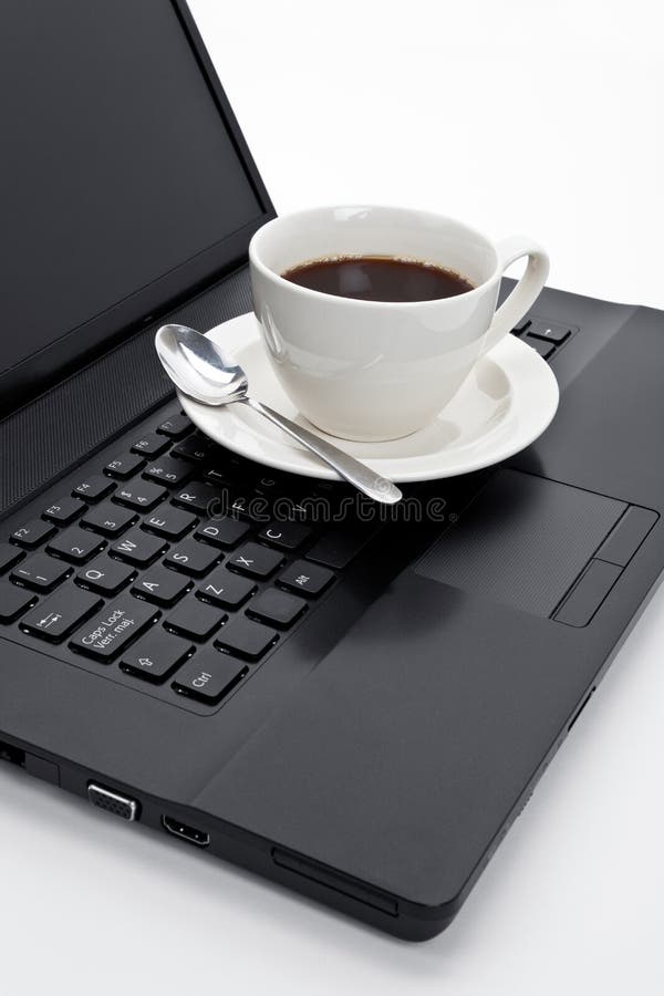 Coffee cup and computer stock photo. Image of refreshment - 227440426