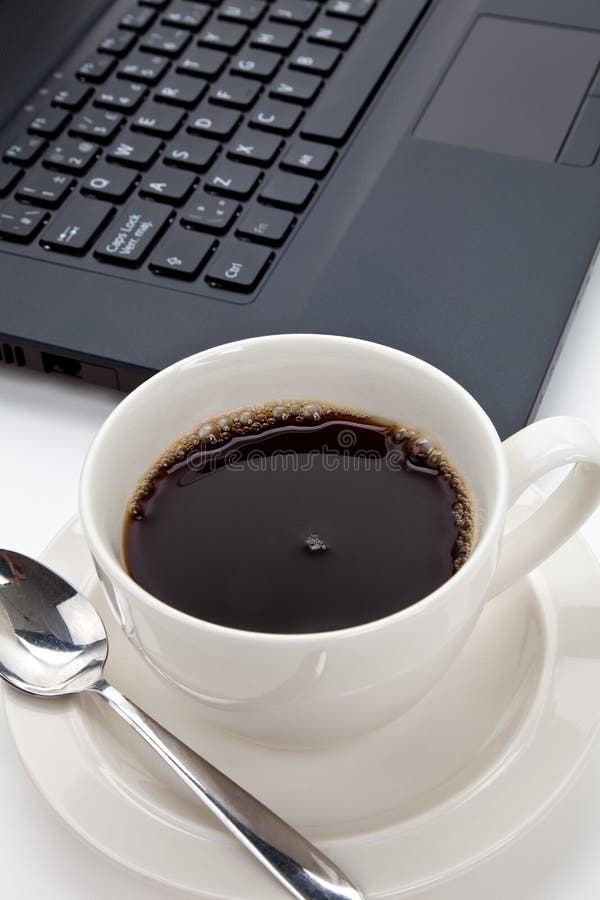 Coffee cup and computer stock photo. Image of laptop - 15079664