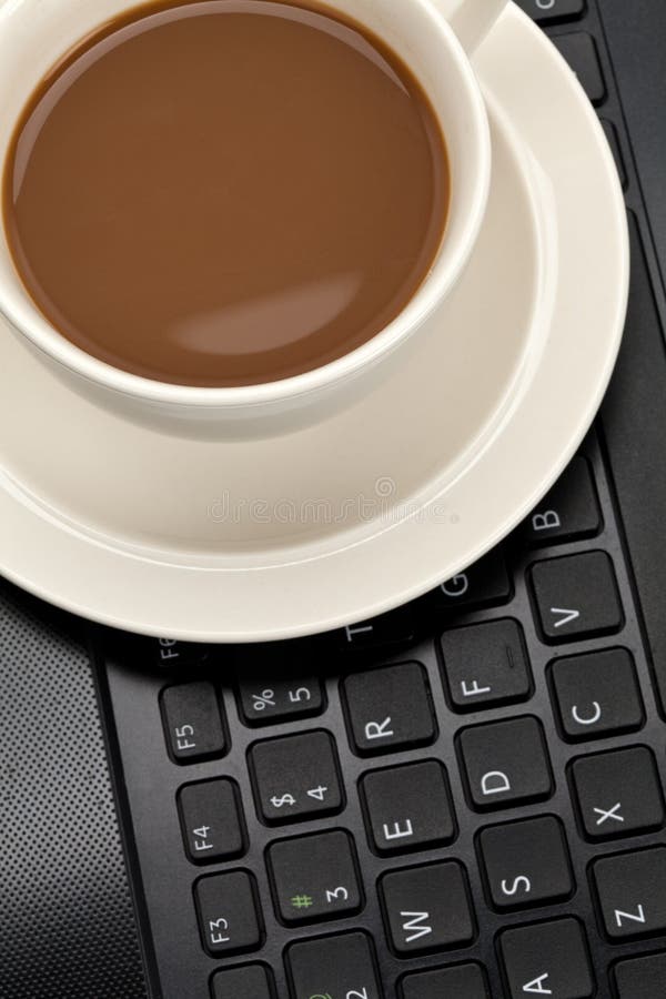 Coffee cup and computer stock photo. Image of laptop - 15079664