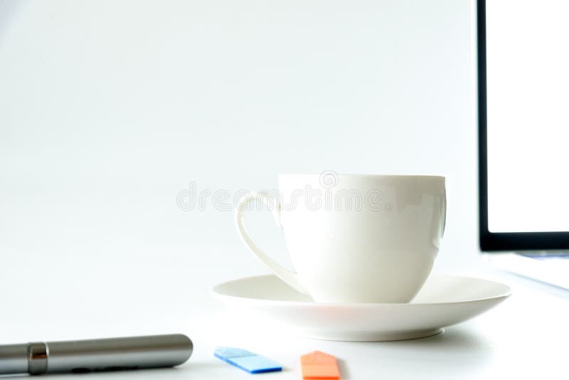 Coffee Cup and Computer Desktop on White Office Desk Table with Stock ...