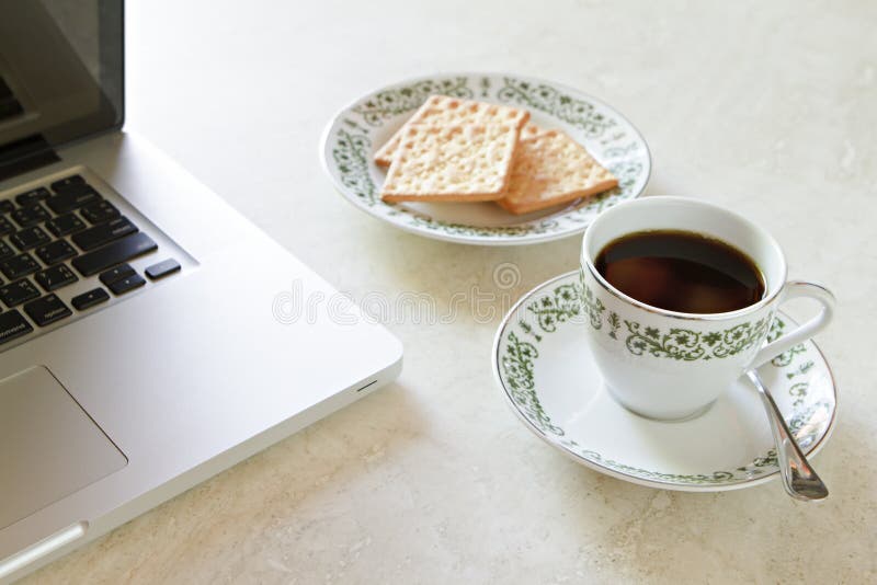 Coffee Cup and Cracker with Laptop on Marble Table Stock Image - Image ...