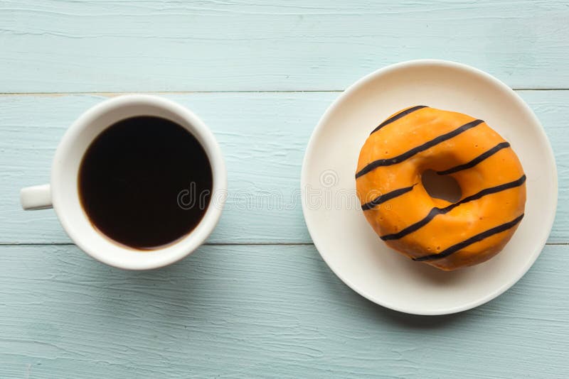 Coffee Cup and Glazed Donut on the Plate. Stock Photo - Image of coffee ...