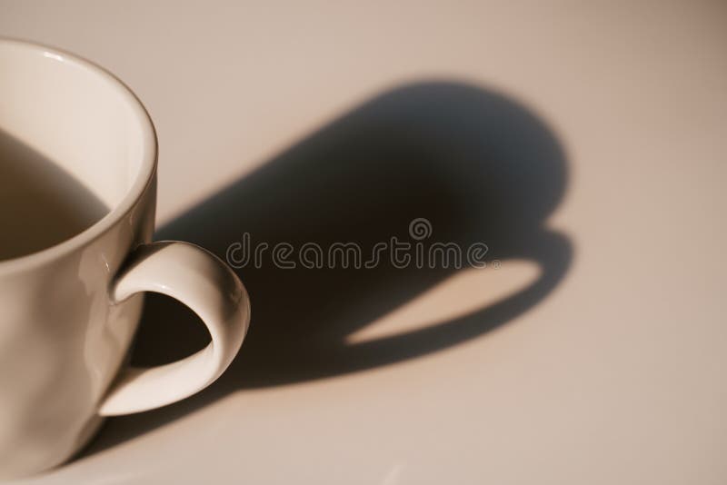 Coffee Cup with Long Shadow Side View Stock Photo - Image of light ...