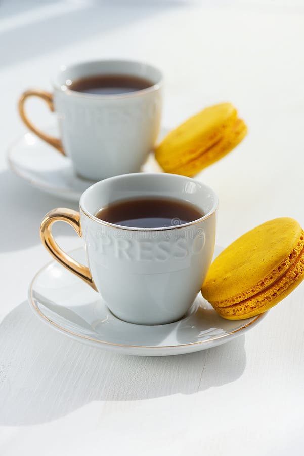 Coffee Cup and Macaroons on White Wood Table Stock Image - Image of ...