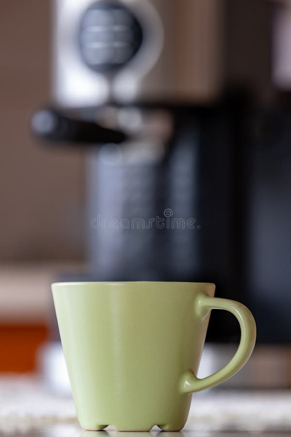 Coffee Cup and Coffee Maker on the Kitchen Table. Morning Coffee in the ...