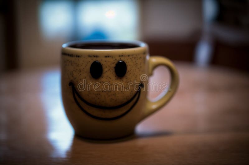 Coffee Cup or Mug with Smiley Happy Face Sitting on a Table. Ai ...