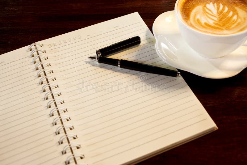 Coffee Cup,notebook and Pen Stock Image - Image of desk, grain: 37021665