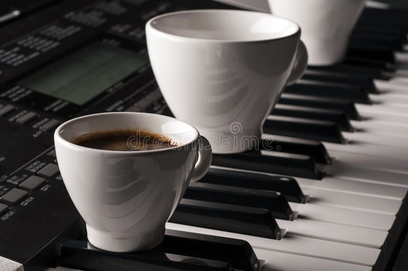 Coffee Cup on Piano Keyboard Stock Image - Image of studio, foam: 62445885