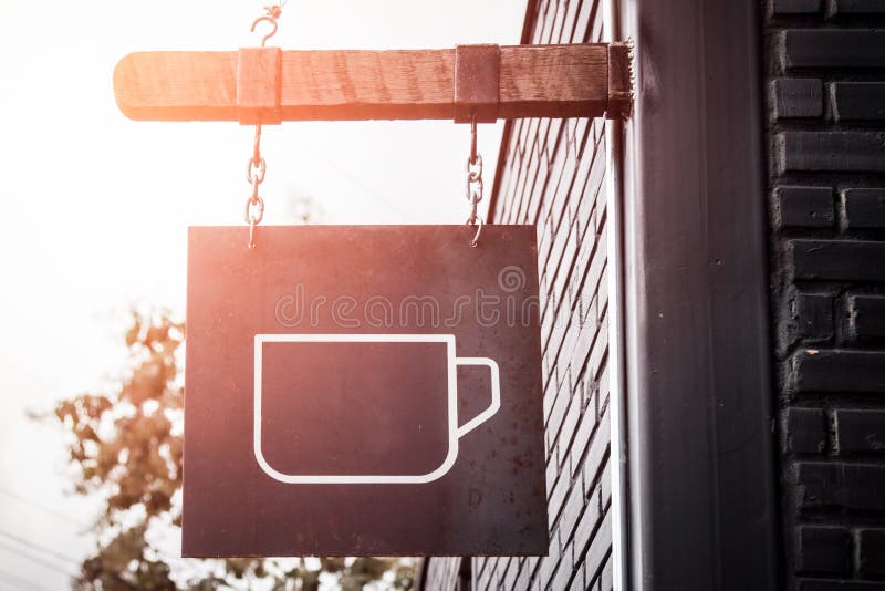 Coffee Cup Sign Hanging on Wood Bar Stock Photo - Image of coffee, wall ...