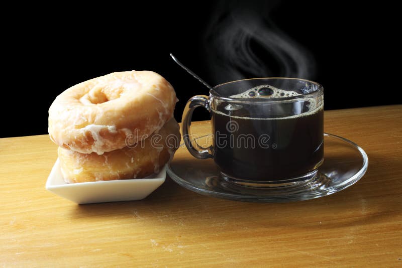 Coffee Cup with Steam and Donut Stock Photo - Image of chocolate, focus ...