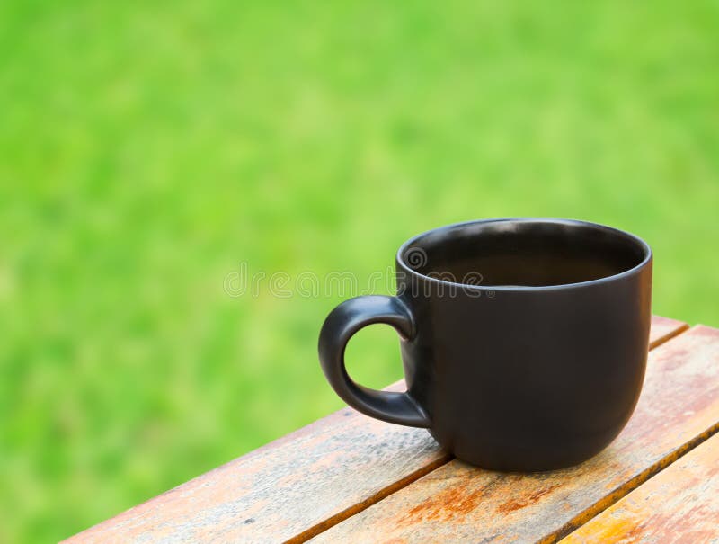Coffee cup on table stock image. Image of breakfast, flower - 26181583