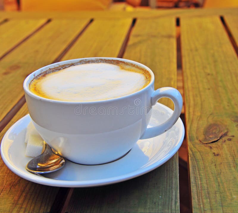 Coffee cup on the table stock photo. Image of italian - 76460220