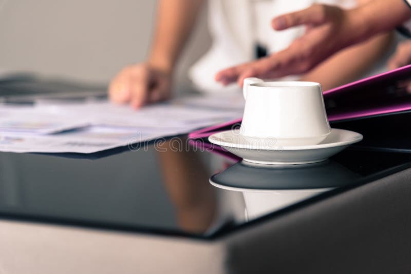 A Coffee Cup with White Plate on the Office Desk. Stock Image - Image ...