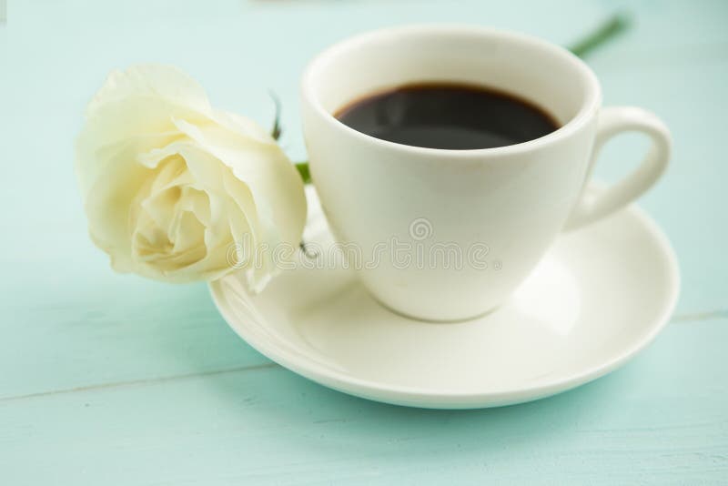 Coffee cup and white rose stock photo. Image of 14th - 171352760