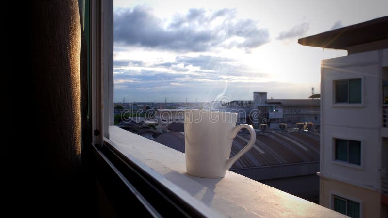 Coffee Cup on Window with Sunset Background, Coffee Cup Stock Image ...