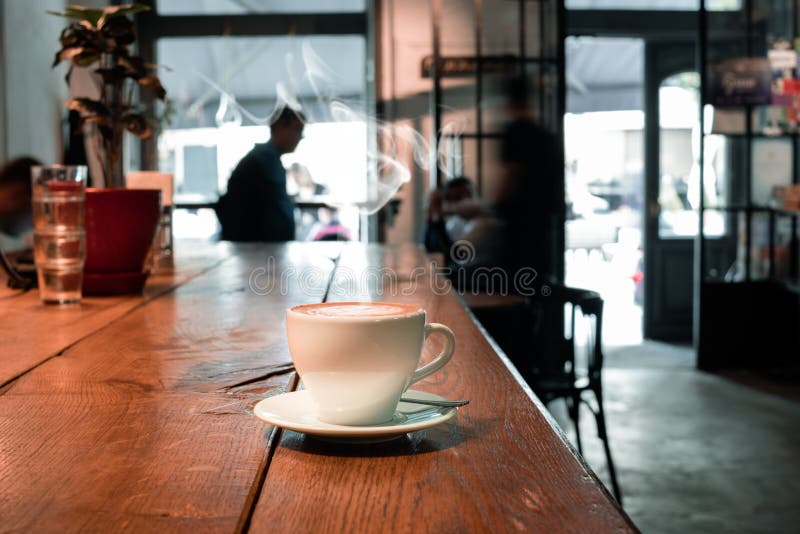 Coffee Cup on Wood Table in Cafe Stock Photo - Image of people ...