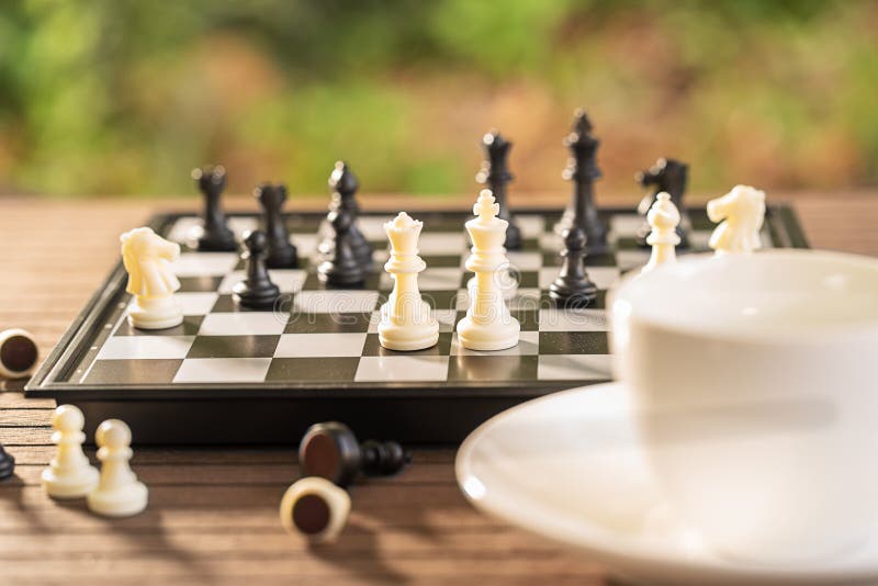 Coffee Cup on Wood Table with Chess Board Stock Photo - Image of ...
