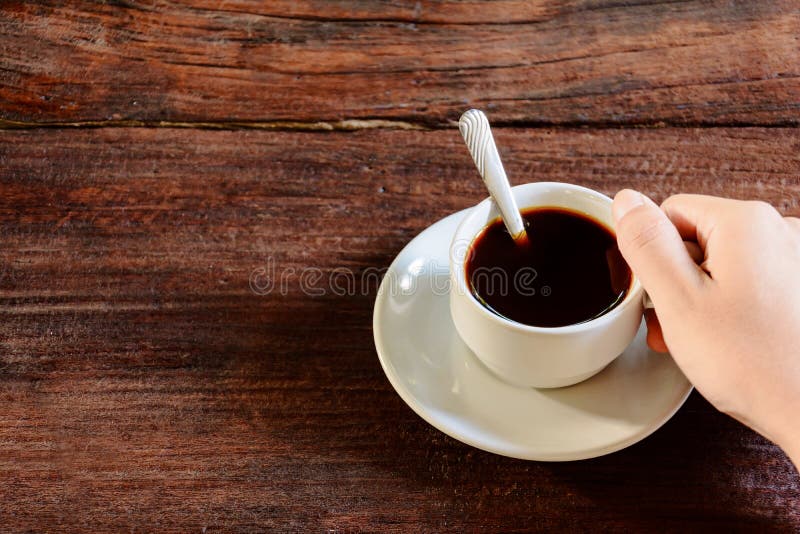 Coffee cup on wood table stock photo. Image of roasted - 91391010