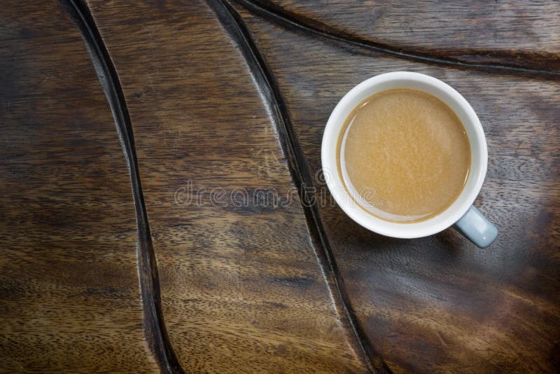 Coffee cup on wood table. stock image. Image of refreshing - 71166243