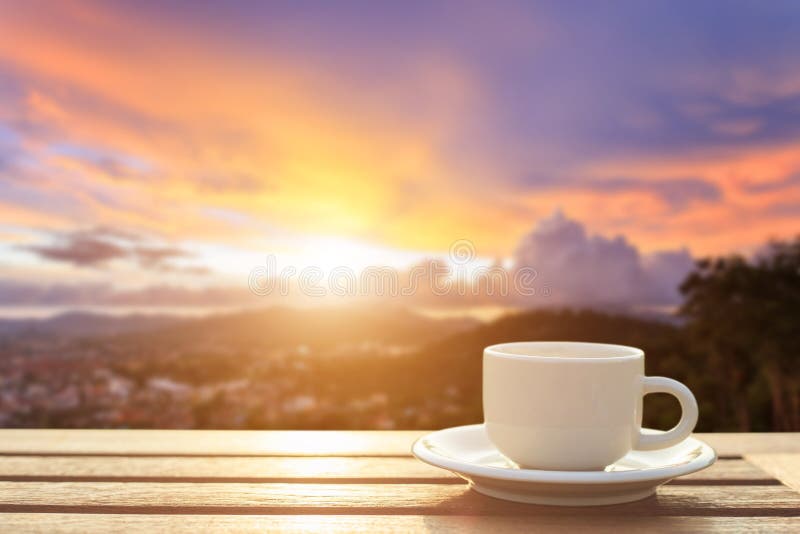 Coffee Cup on Wood Table at Sunset or Sunrise Time Stock Photo - Image ...