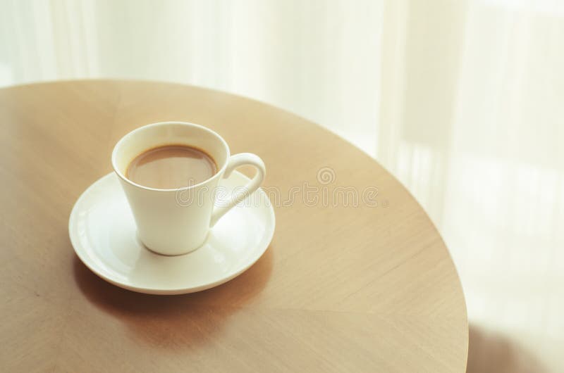 Coffee cup on wood table stock image. Image of decoration - 49375981