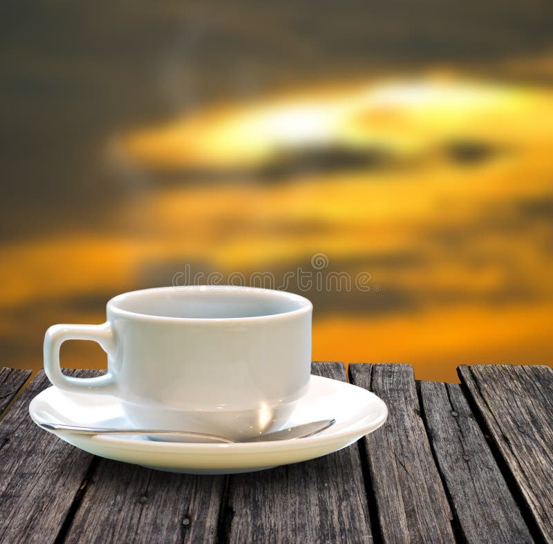 Coffee Cup On The Wooden Table Stock Photo - Image of wooden, sunset ...