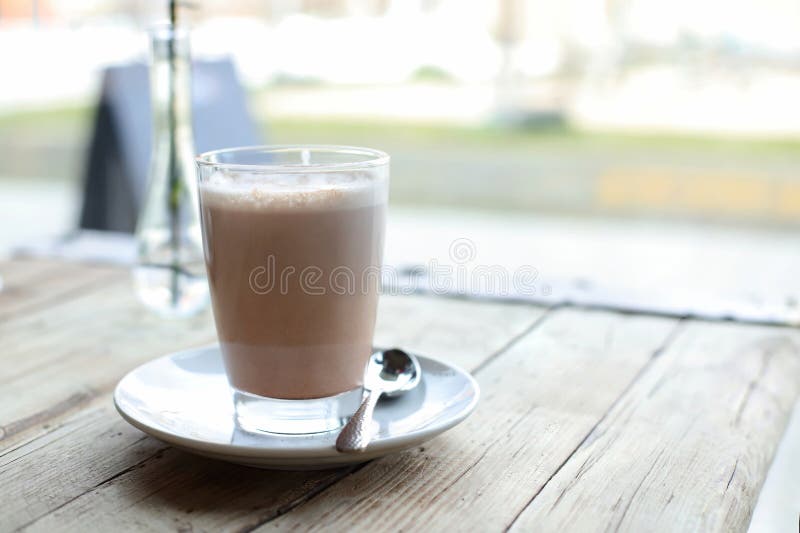 Coffee Cup on Wooden Table in Cafe Stock Photo - Image of drink, table ...