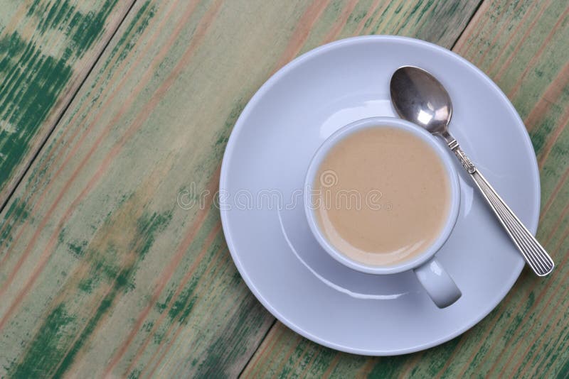 Coffee Cup on Wooden Table stock photo. Image of desk - 64445722