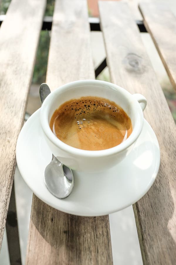 Coffee cup on wooden table stock photo. Image of natural - 40257902