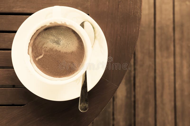 Coffee cup on wooden table stock photo. Image of cafe - 35501248