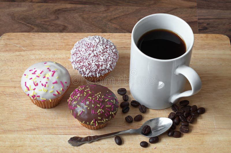Cup of coffee and cupcakes stock photo. Image of delicious - 31769922