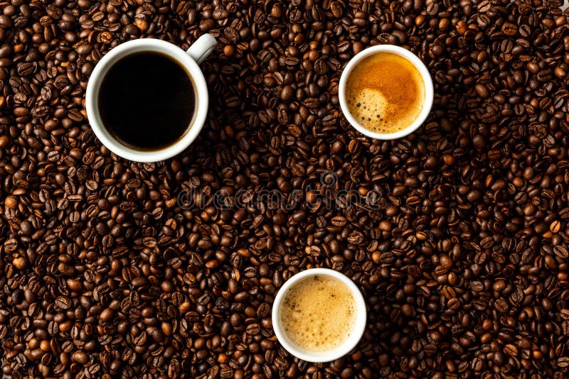 Coffee Cups on Coffee Beans Background Stock Photo - Image of cafe ...