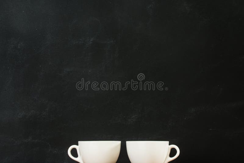 Coffee Cups Showing at the Bottom of the Black Stock Image - Image of ...