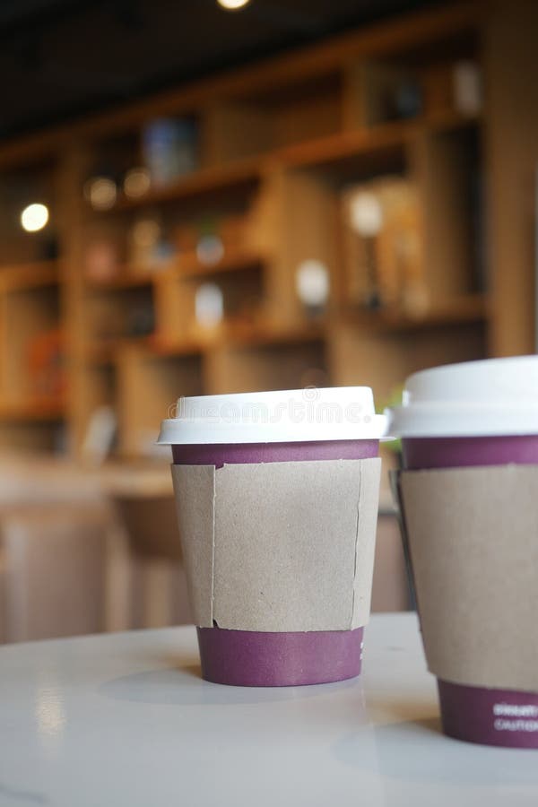Coffee Cups on a Table in a Cozy Cafe Setting Stock Photo - Image of ...