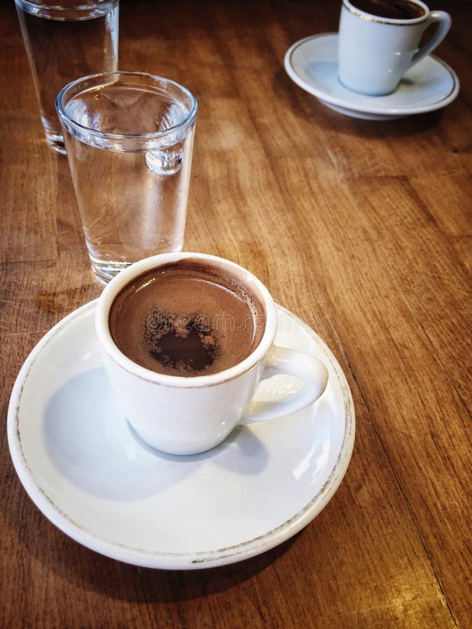 Coffee Cups and Water on Wooden Table Stock Image - Image of caffeine ...