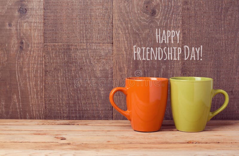 Coffee Cups on Wooden Table. Friendship Day Celebration Stock Photo ...