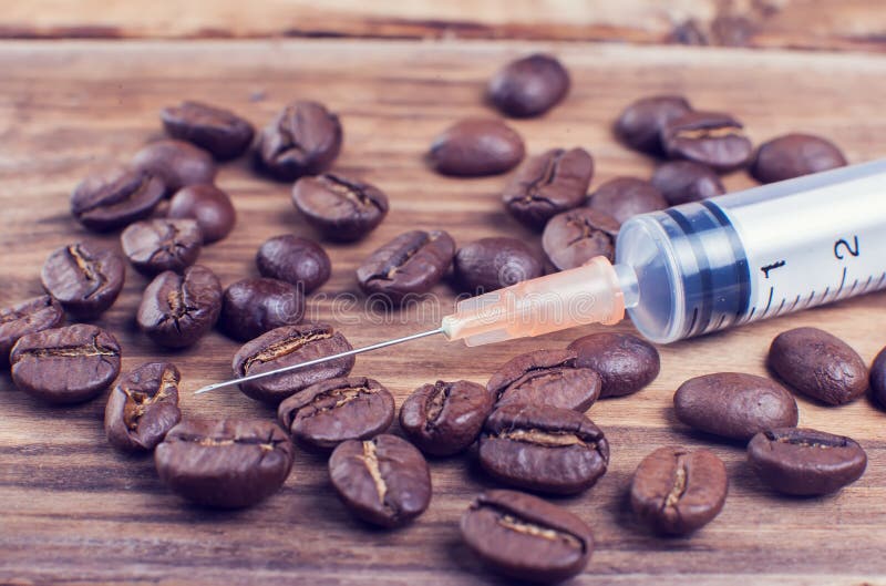 Coffee Dependence Syringe with Beans of Coffee Stock Image - Image of ...