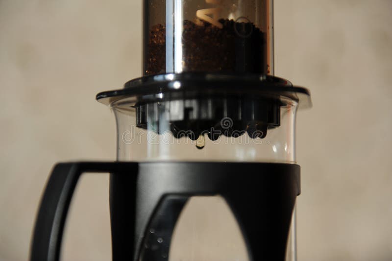 Coffee Drips through the Filter Close-up, Individual Drops Stock Image ...